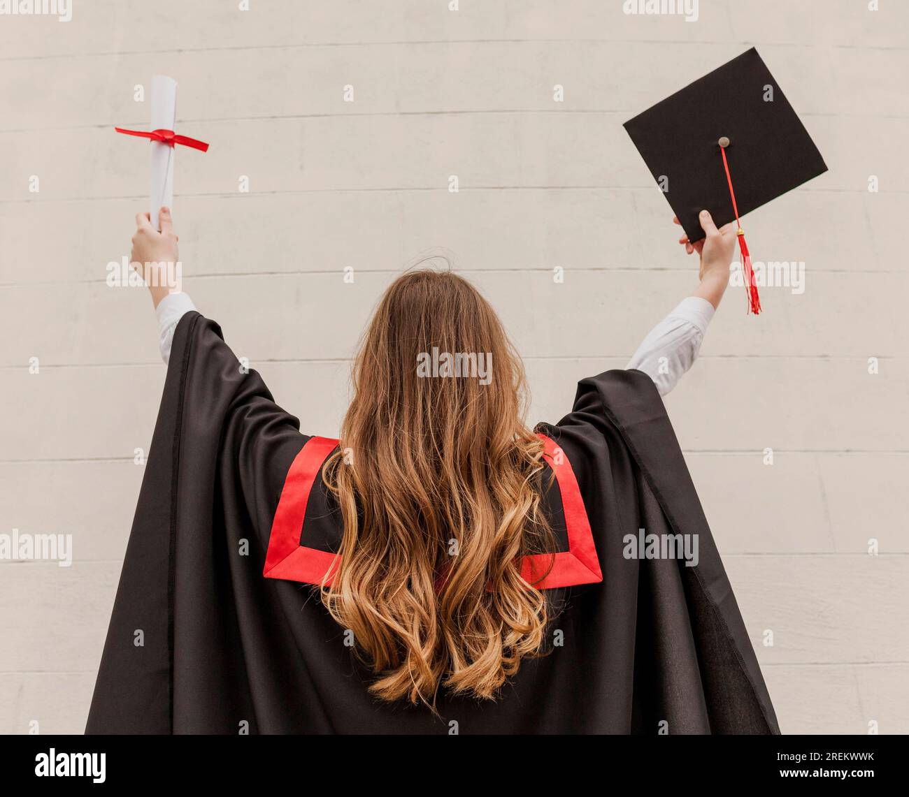Front view graduated girl with back. Beautiful photo Stock Photo - Alamy