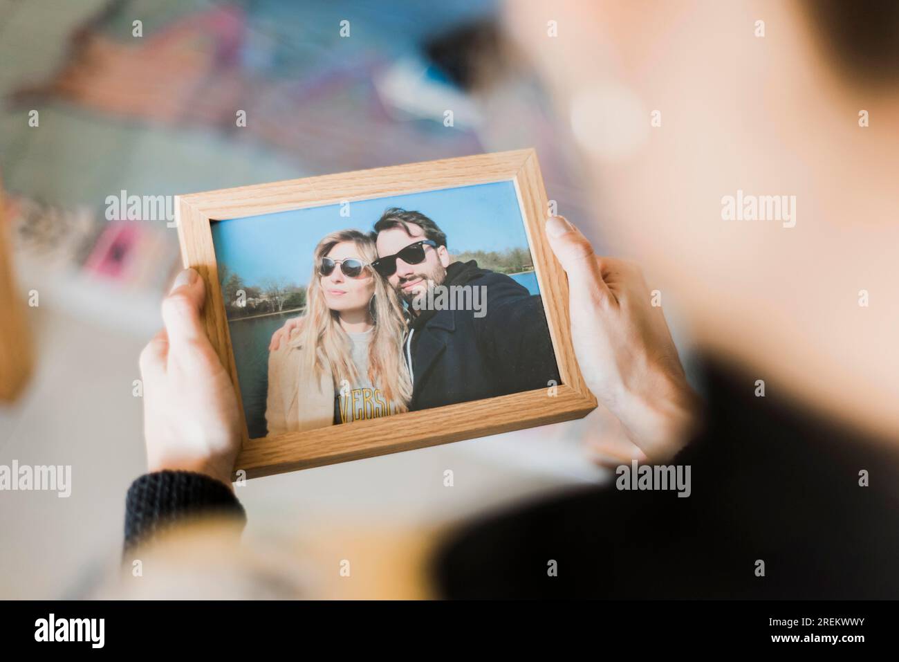 Human hand holding frame Stock Photo - Alamy