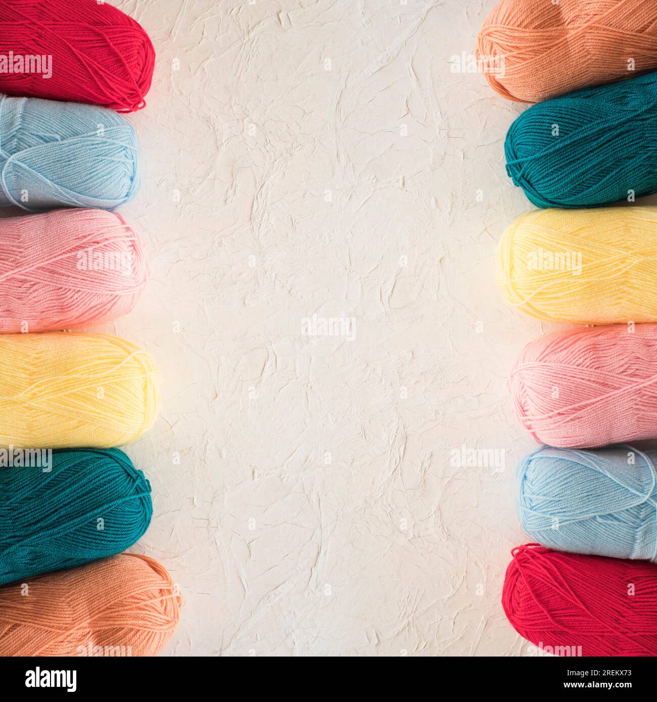 Two rows colorful yarn. Beautiful photo Stock Photo - Alamy