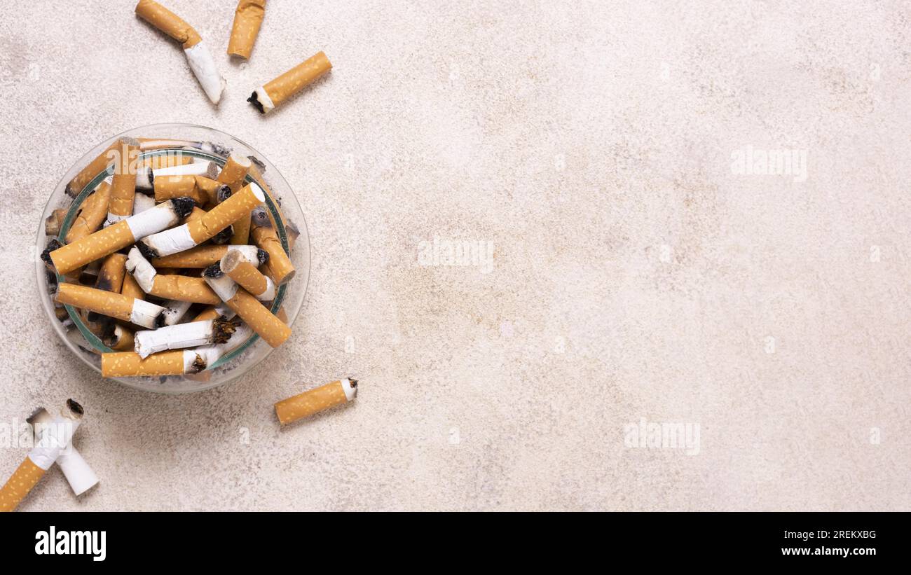 Cigarette butts frame with copy space. High resolution photo Stock ...