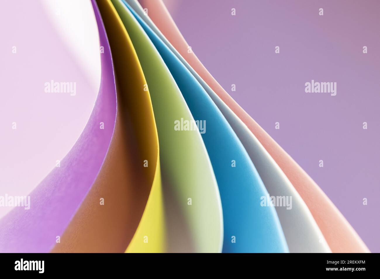 Curved layers colored papers empty background. High resolution photo ...