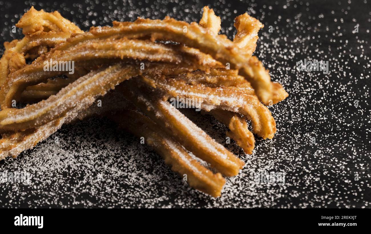 Delicious fried churros with sugar high view. High resolution photo ...