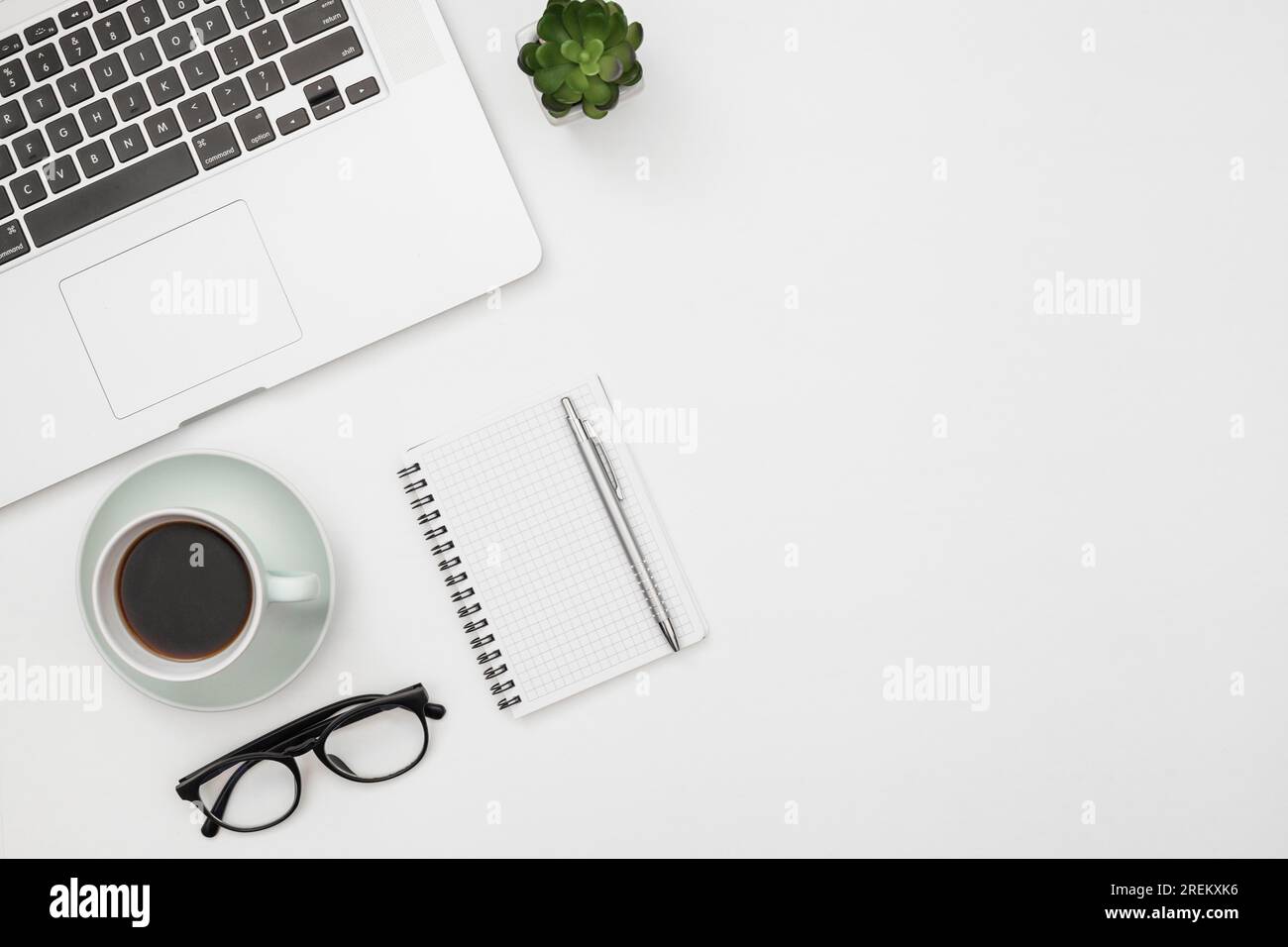 Flat lay laptop mockup with notepad Stock Photo - Alamy