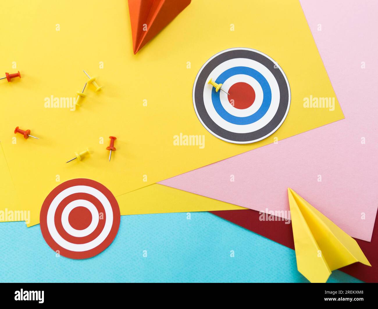 Flat lay paper targets with pins paper planes. High resolution photo ...