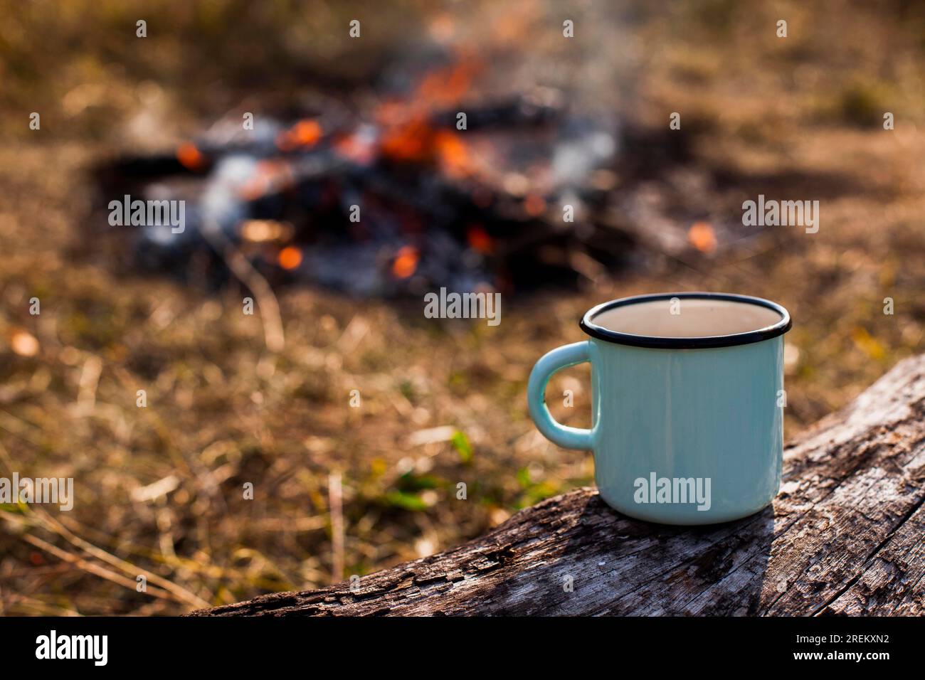 Focused blue cup coffee burned out campfire. High resolution photo ...