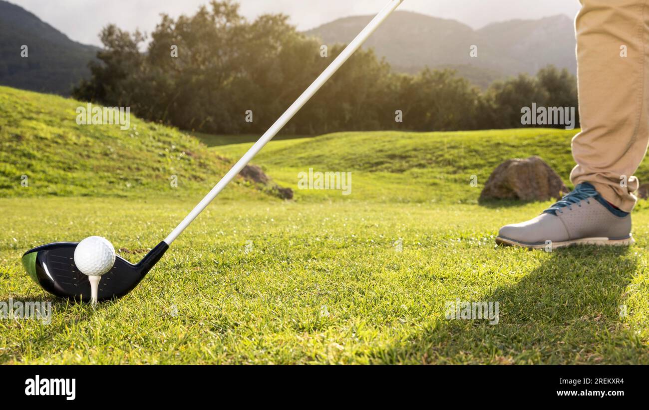 Man practicing golf field. High resolution photo Stock Photo - Alamy