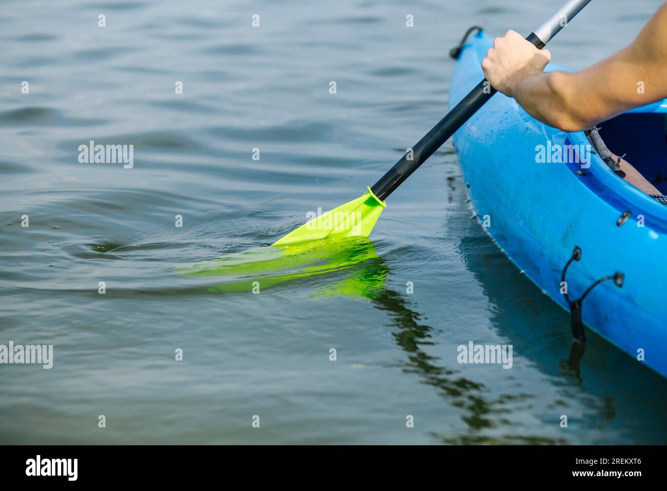 Man paddling kayak lake. High resolution photo Stock Photo - Alamy