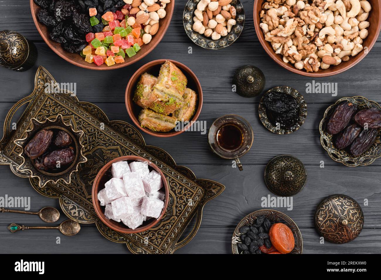 Homemade turkish delight baklava dates dried fruits nuts metallic ...