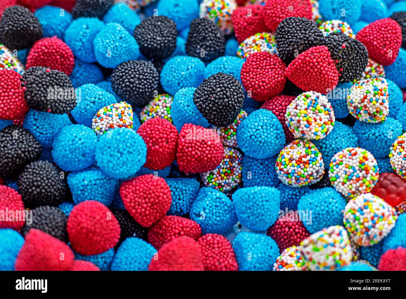 abstract background of red, blue, black and white jellies in the form ...