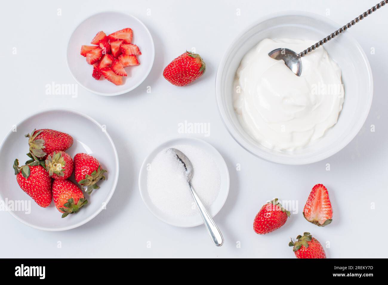 Top view yogurt bowls with strawberries table. High resolution photo ...