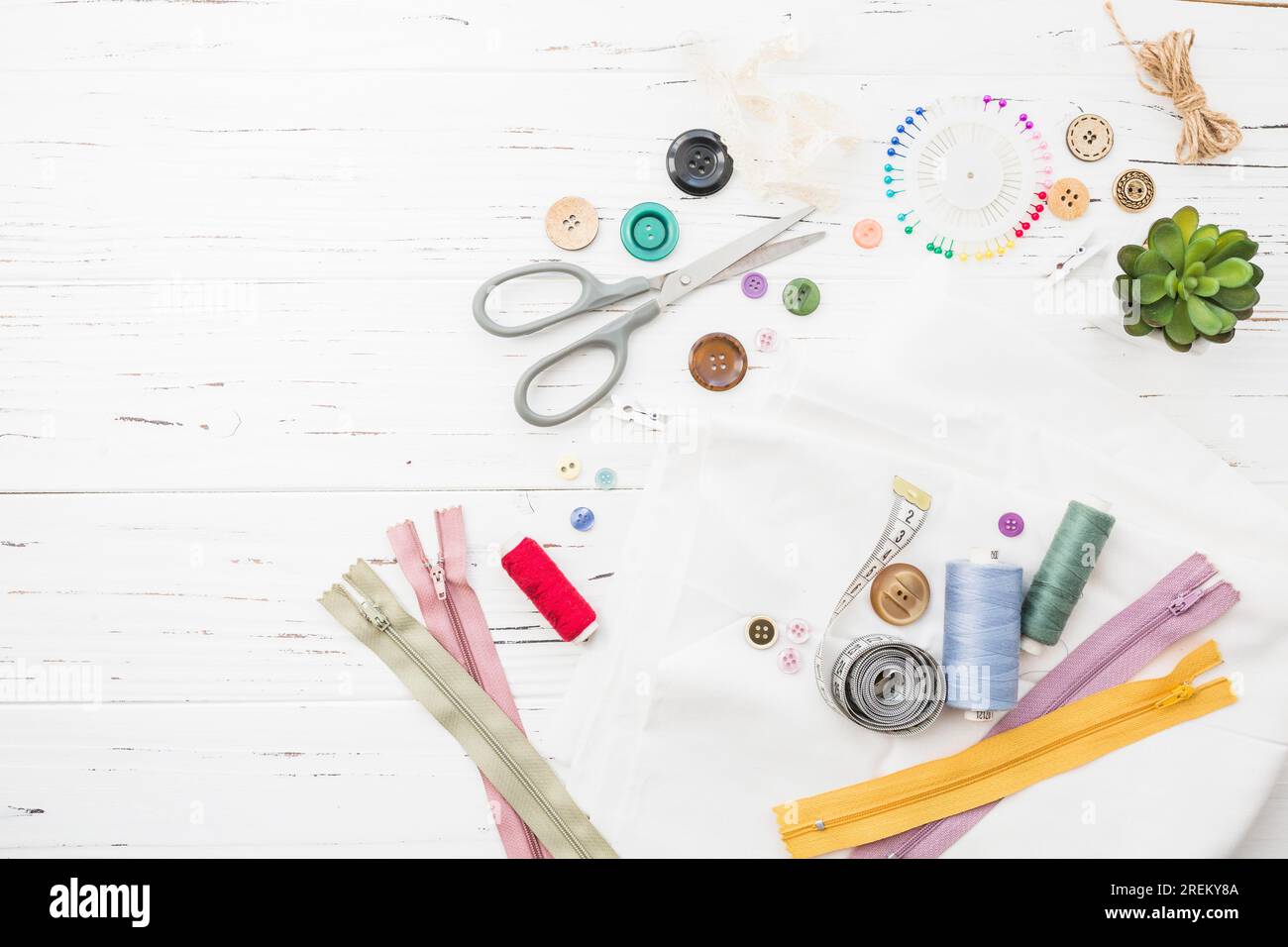 Vivid sewing items wooden background. High resolution photo Stock Photo ...