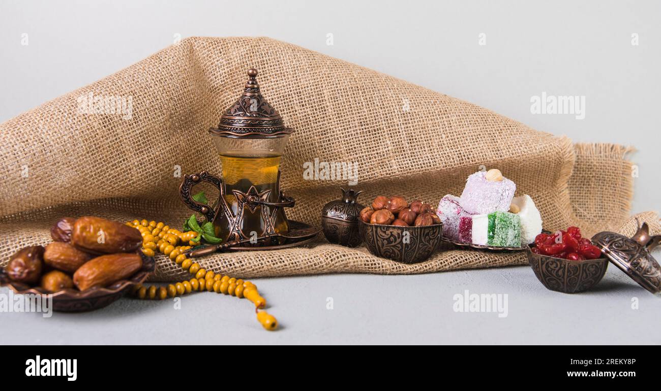 Turkish delight with tea glass dates fruit. High resolution photo Stock ...