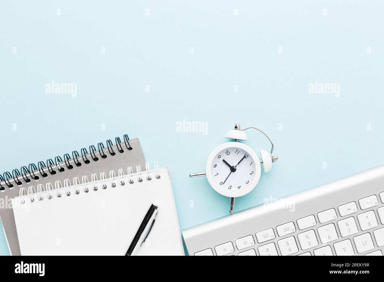 Top view notebook clock arrangement. High resolution photo Stock Photo ...