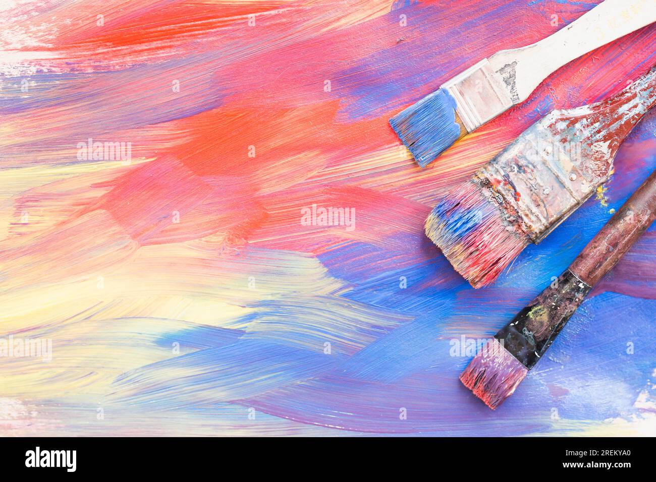 Top view colorful brushstroke dirty paint brushes. High resolution ...