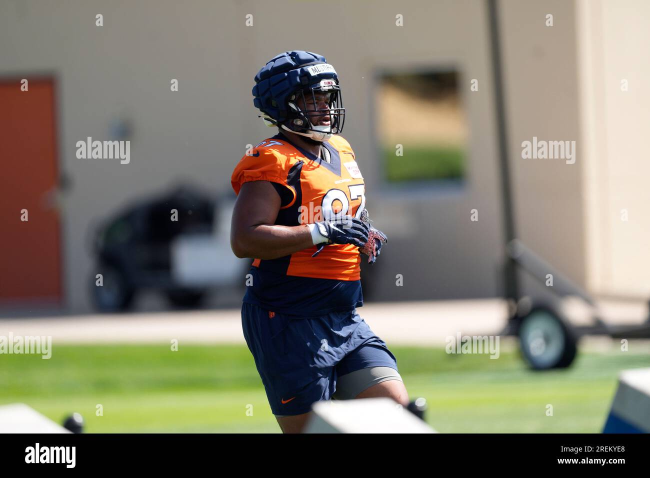 Denver Broncos defensive tackle PJ Mustipher (97) warms up during an ...