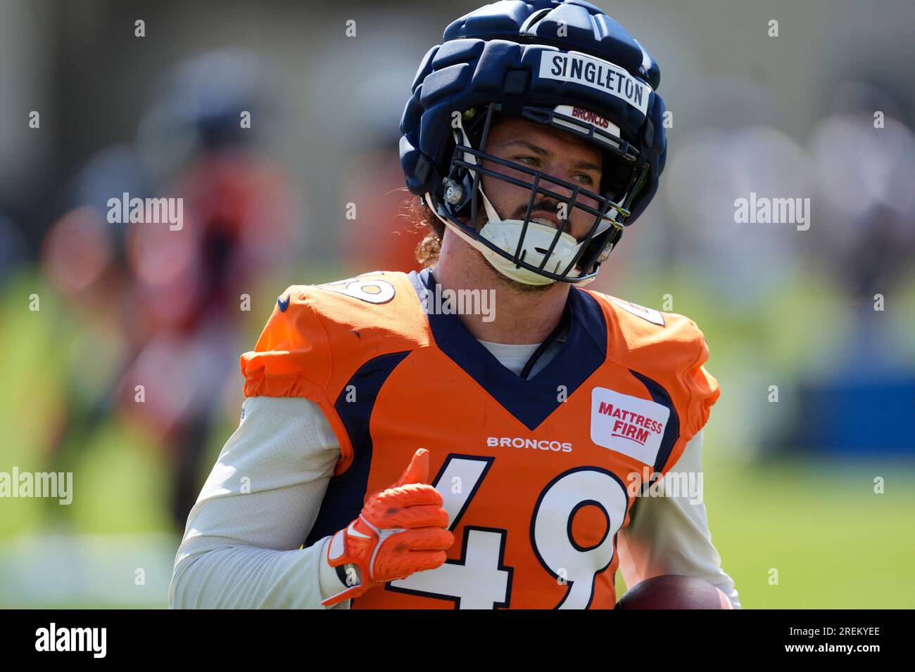 Denver Broncos linebacker Alex Singleton (49) takes part in drills ...