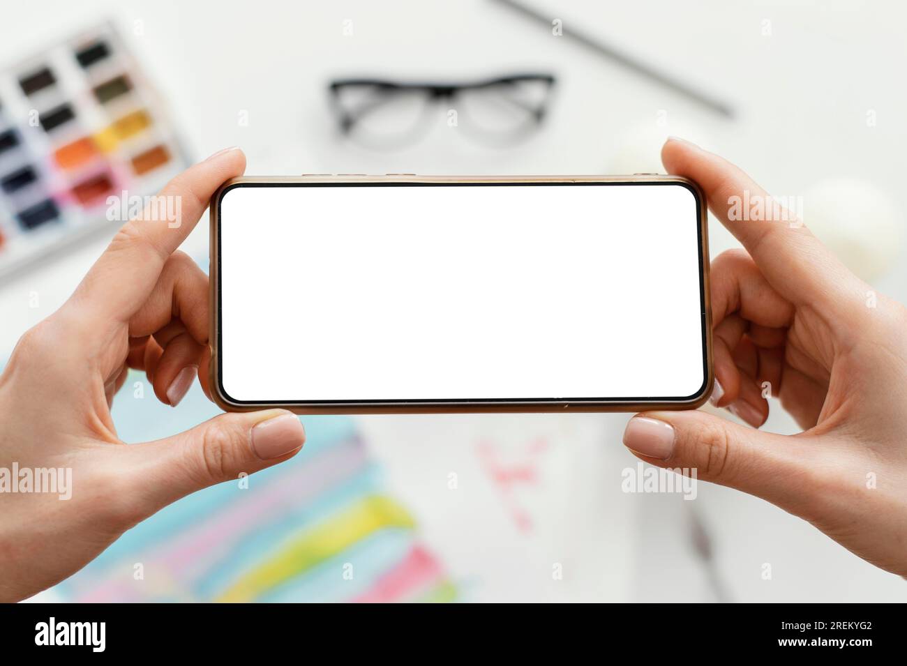 Woman taking her art with her phone. High resolution photo Stock Photo ...