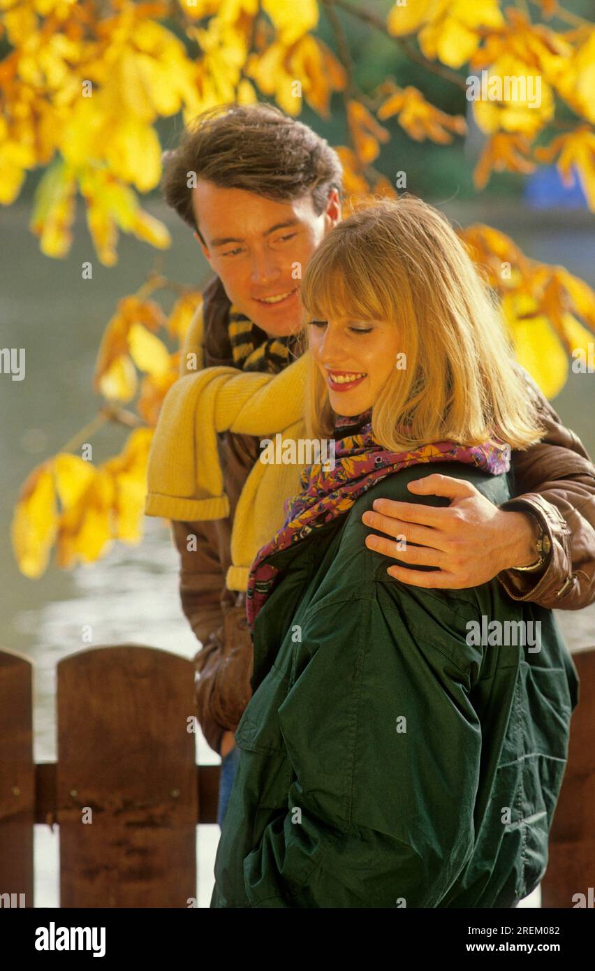 Lovers, man holds woman in his arms in love, walk Stock Photo - Alamy