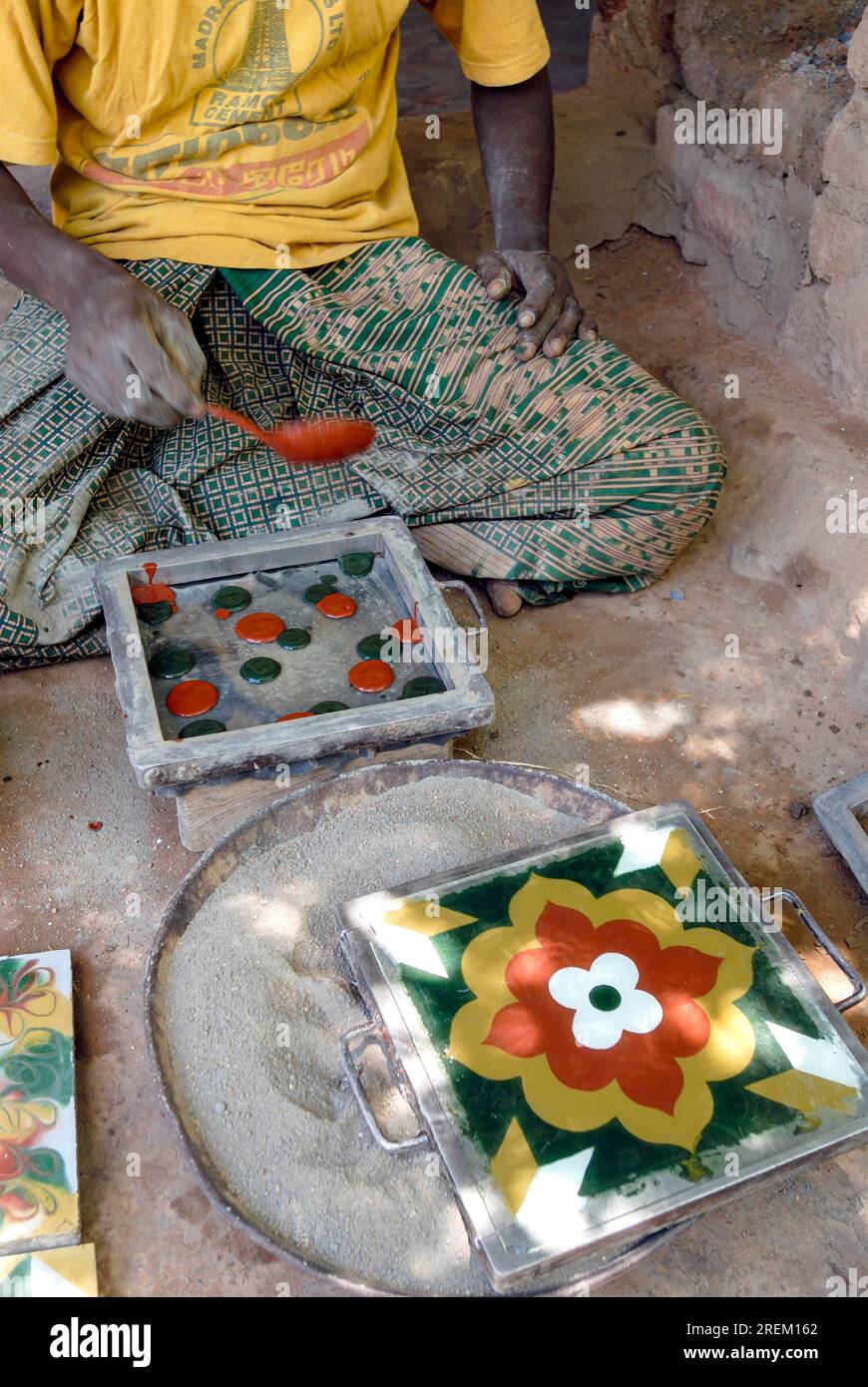 A man making Athangudi kannadi kal, Process of making tile in Athangudi ...