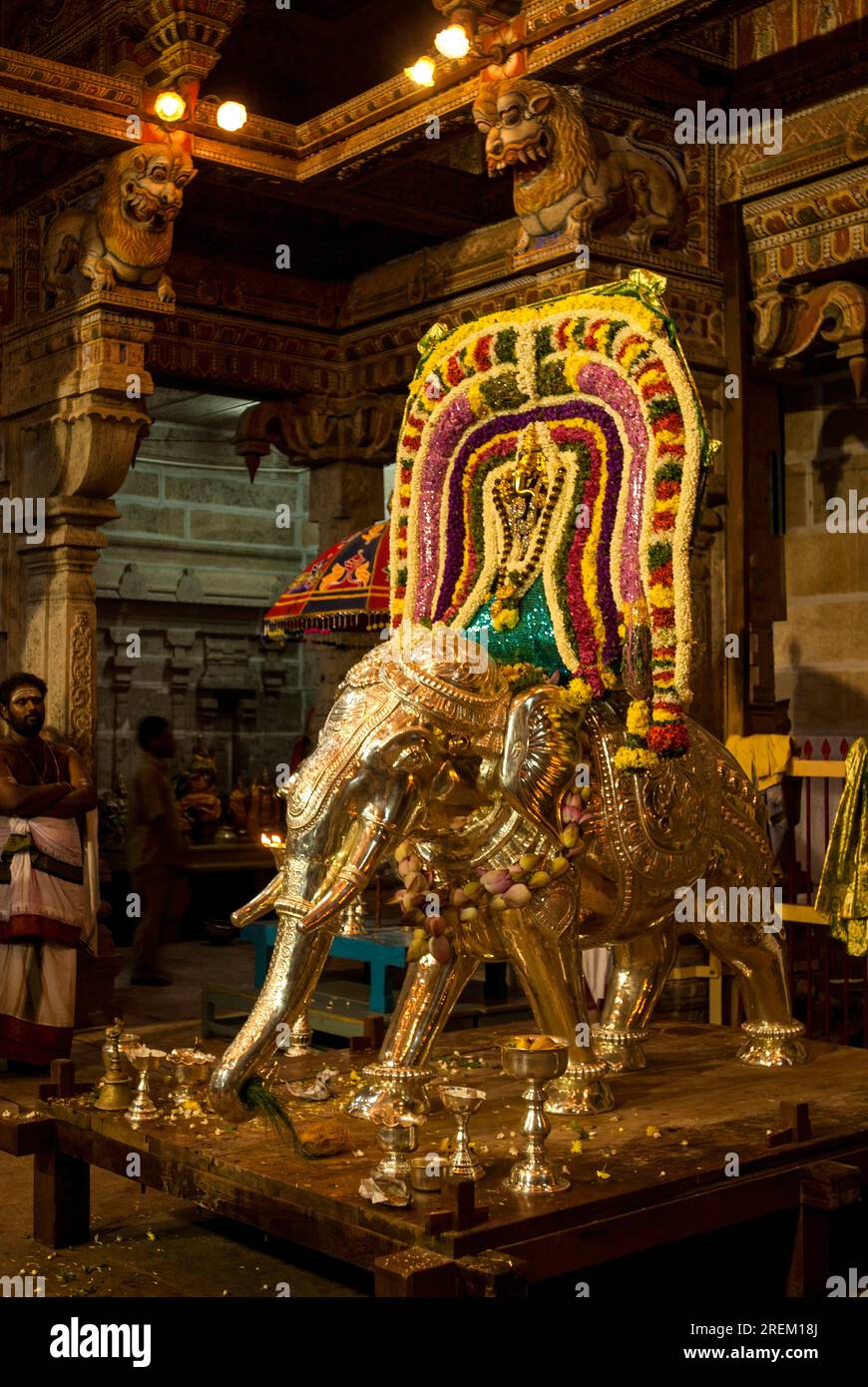 Golden Ganesha mounted on silver elephant vahana vehicle carrier during ...