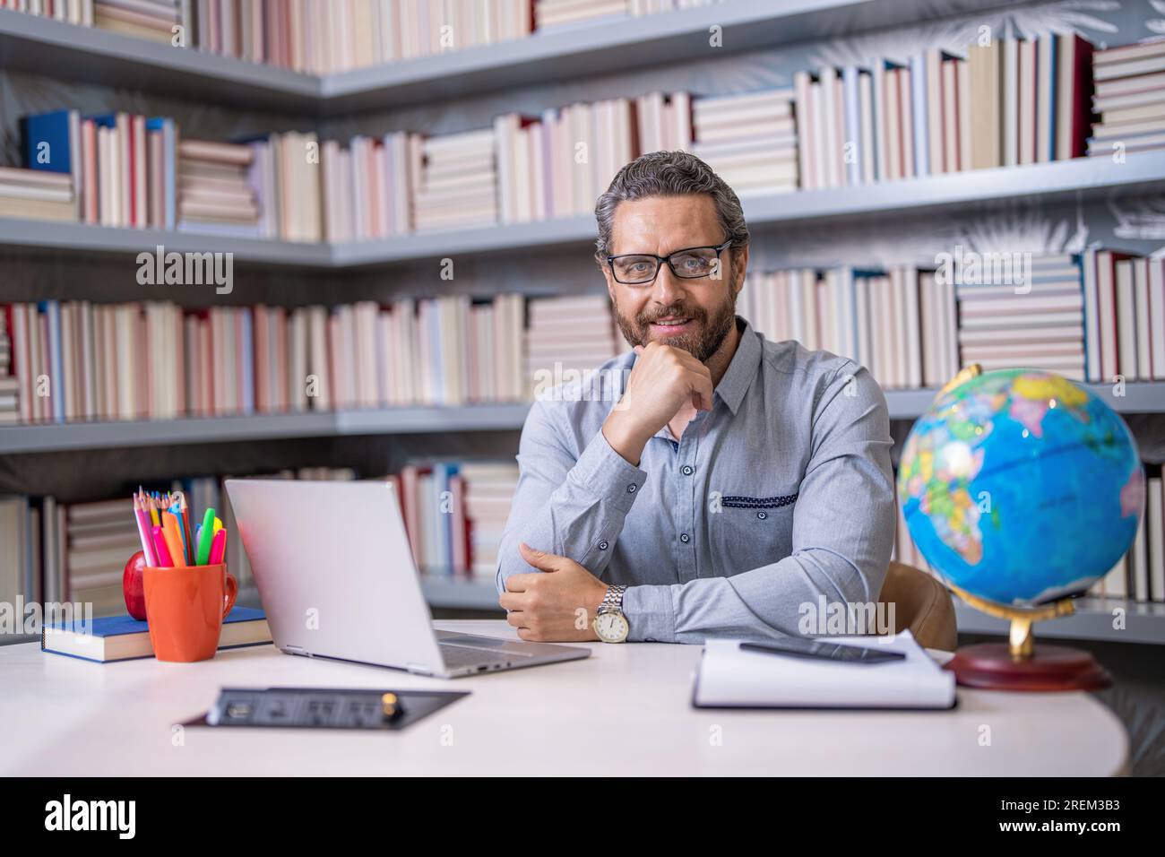 teacher work on laptop. Teacher do remote education with classes ...