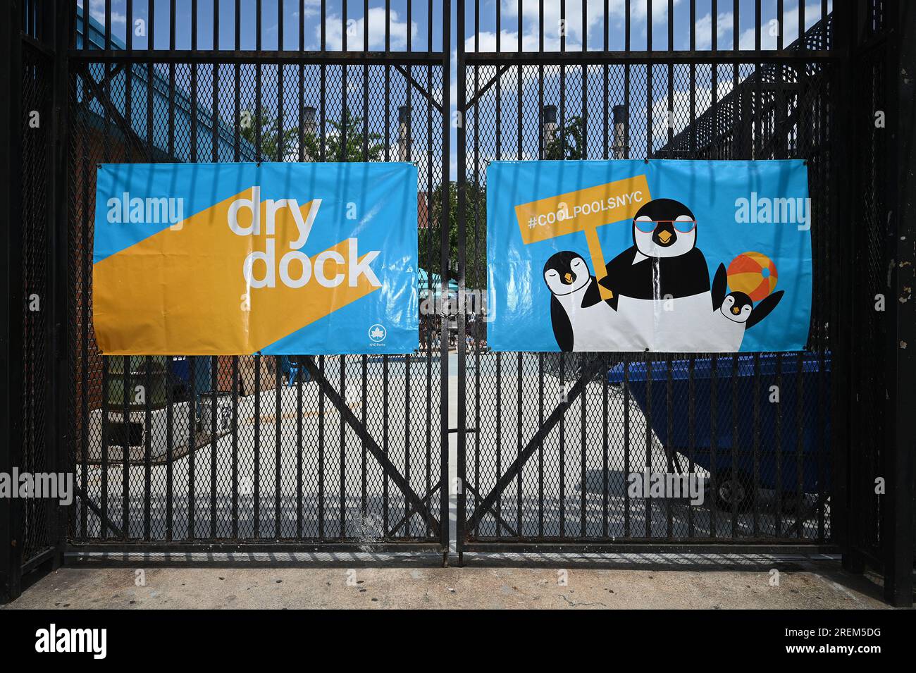New York, USA. 28th July, 2023. People swim at the Dry Dock public pool ...