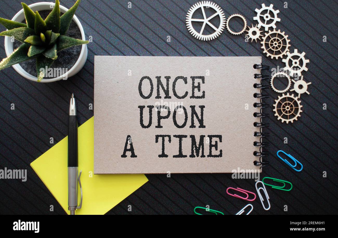 Once upon a time written on a paper Stock Photo - Alamy