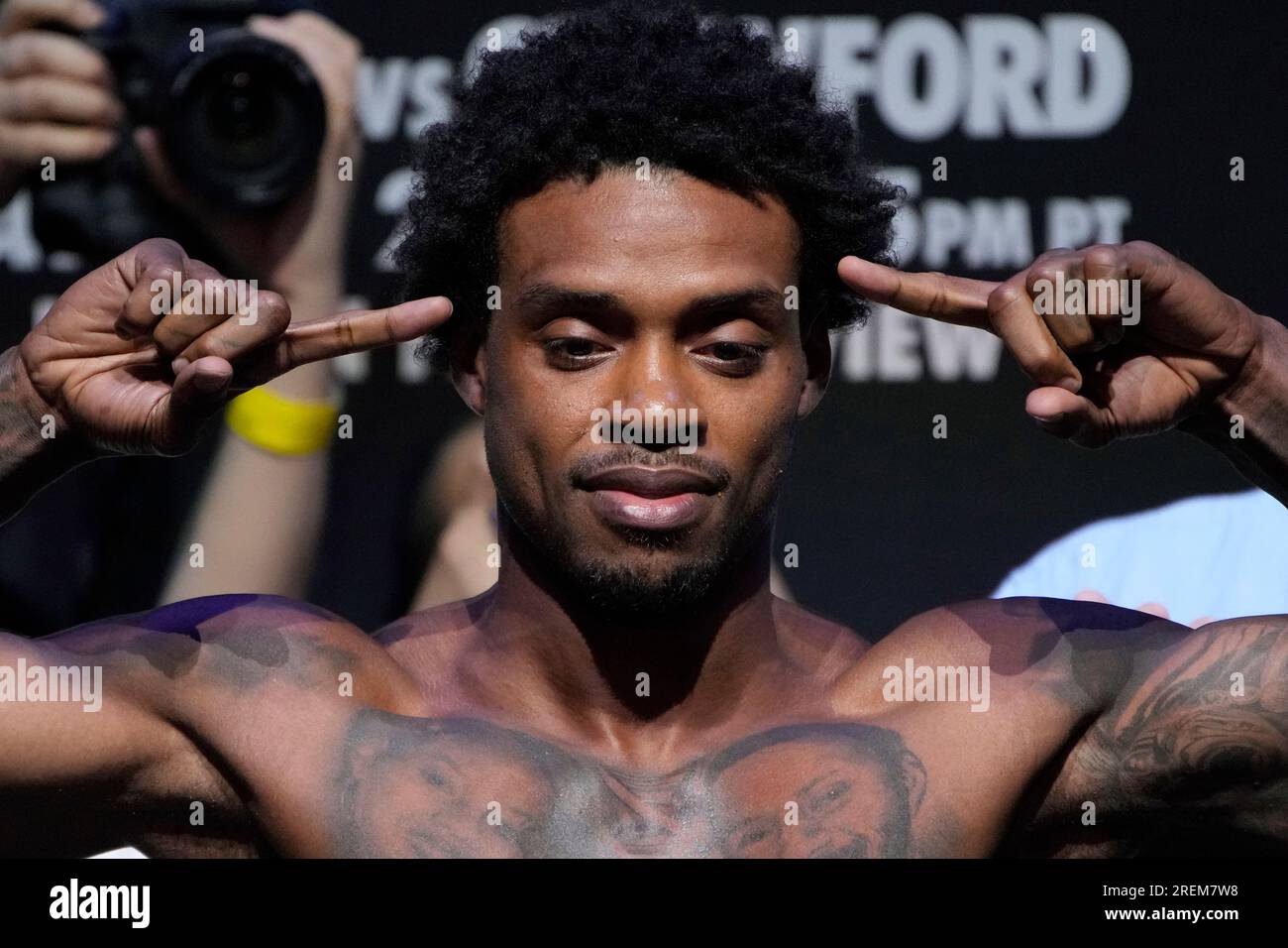 Errol Spence Jr. poses on the scale during a weigh-in Friday, July 28 ...