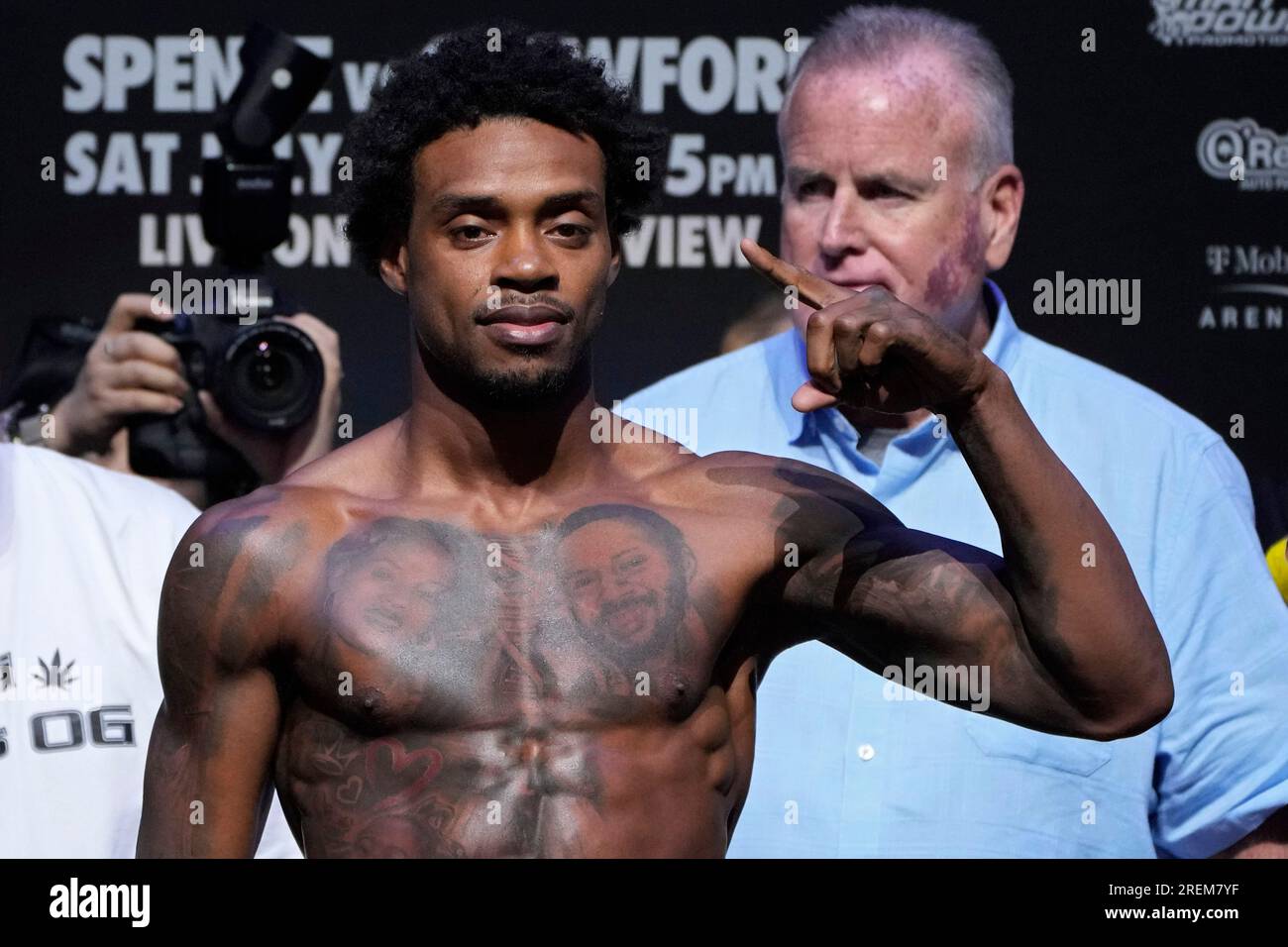 Errol Spence Jr. poses on the scale during a weigh-in Friday, July 28 ...