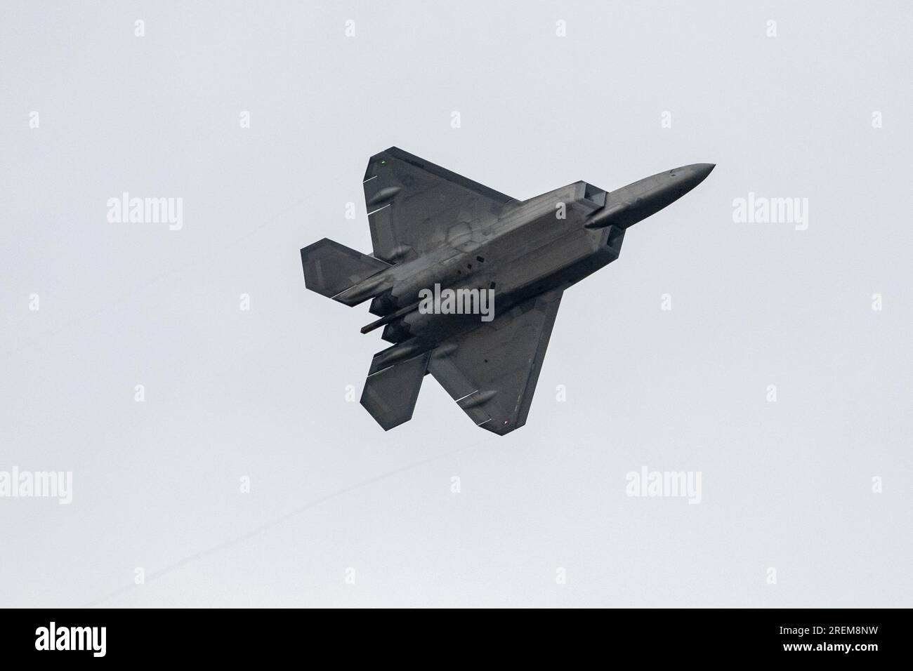 A U.S. Air Force F-22 Raptor assigned to the 3rd Wing flies above Joint ...