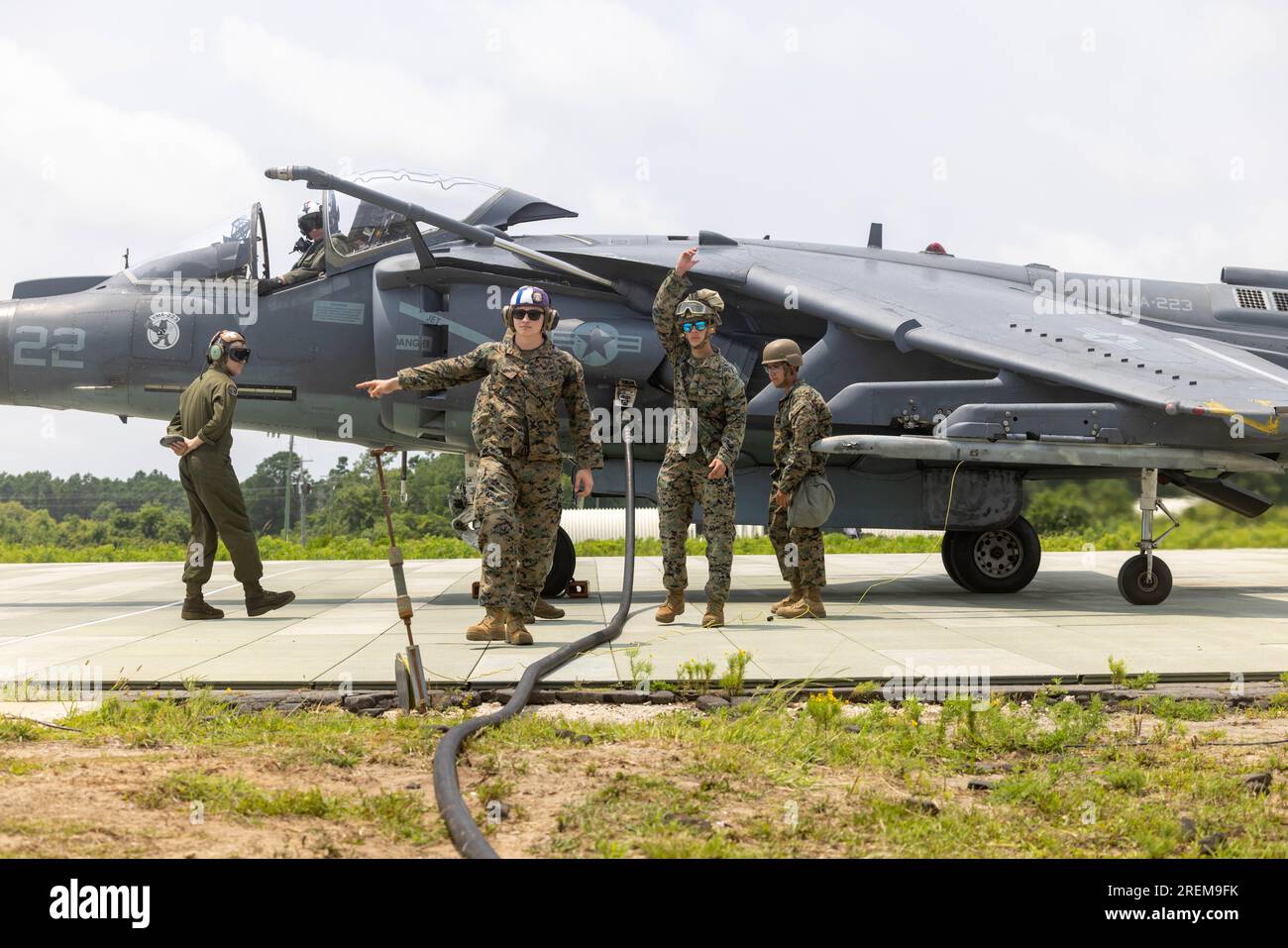 U.S. Marines Cpl. Devon Terry, center left, and Pfc. William Fernandez ...