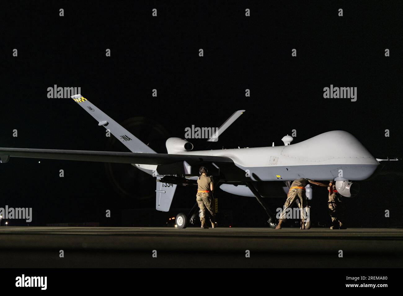 U.S. Air Force Airmen from the 432nd Maintenance Squadron prepare an MQ ...