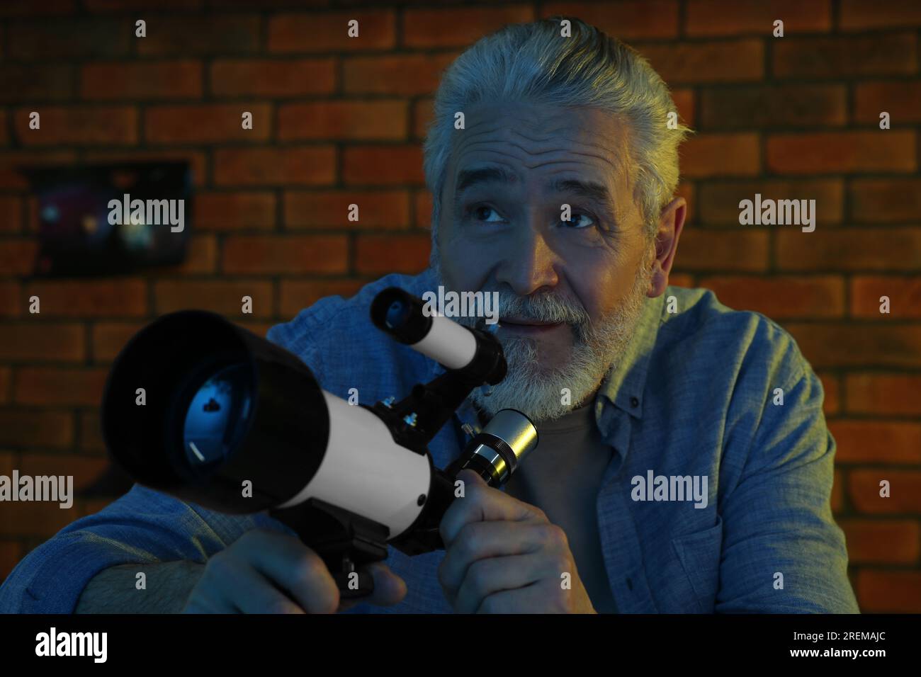 Person using telescope at night hi-res stock photography and images - Alamy