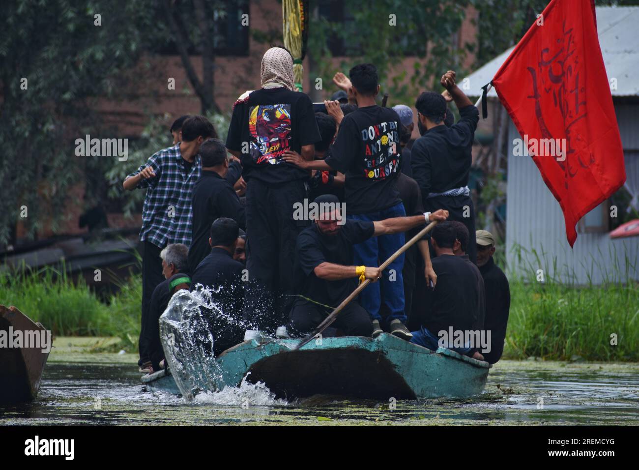 Kashmiri Shiite Muslims chant religious slogans as they participate in ...