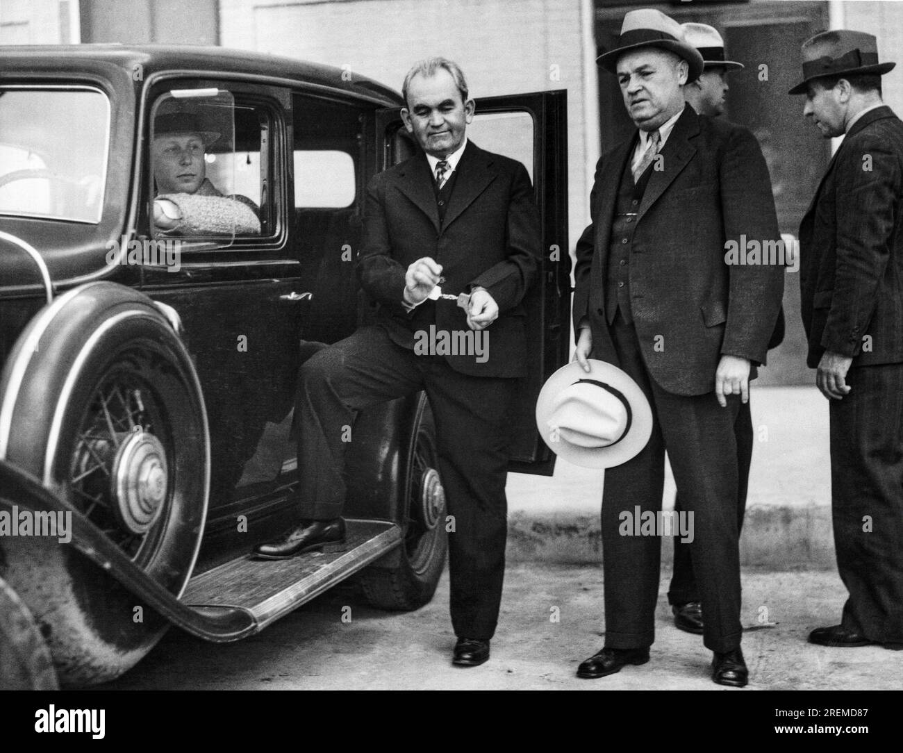 San Francisco, California: c. 1938 Tom Mooney entering a car wearing ...