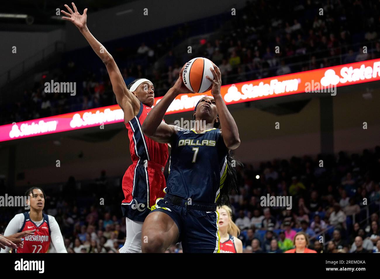 Dallas Wings center Teaira McCowan (7) goes to the basket as Washington ...