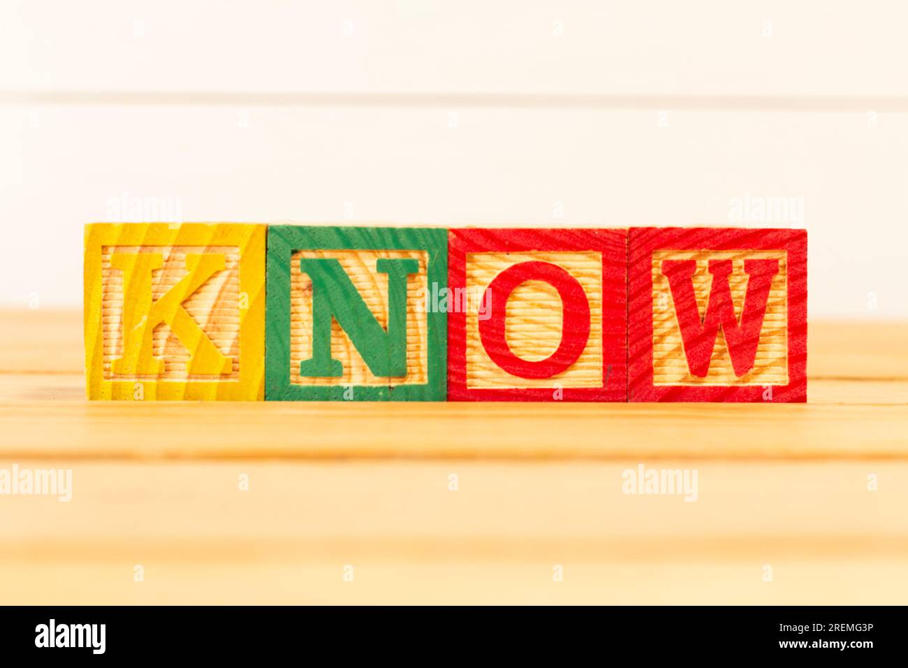 Spectacular colorful letters on wooden cubes on a wooden board with the ...