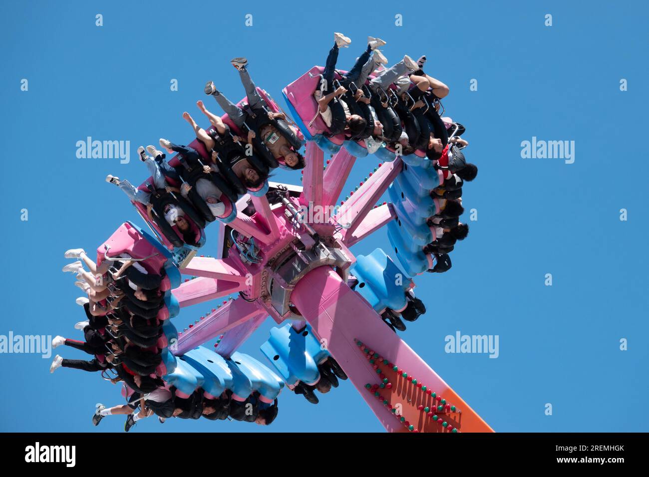 Hong Kong, CHINA - JULY 24, 2023 - Visitors ride a "360-degree pendulum ...