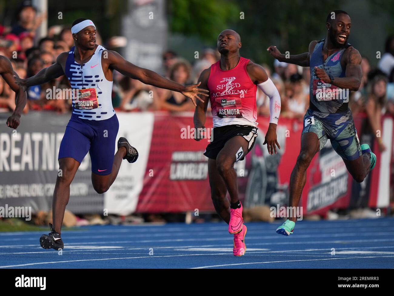 Aaron Brown, left, celebrates after winning the 100-meter final and ...