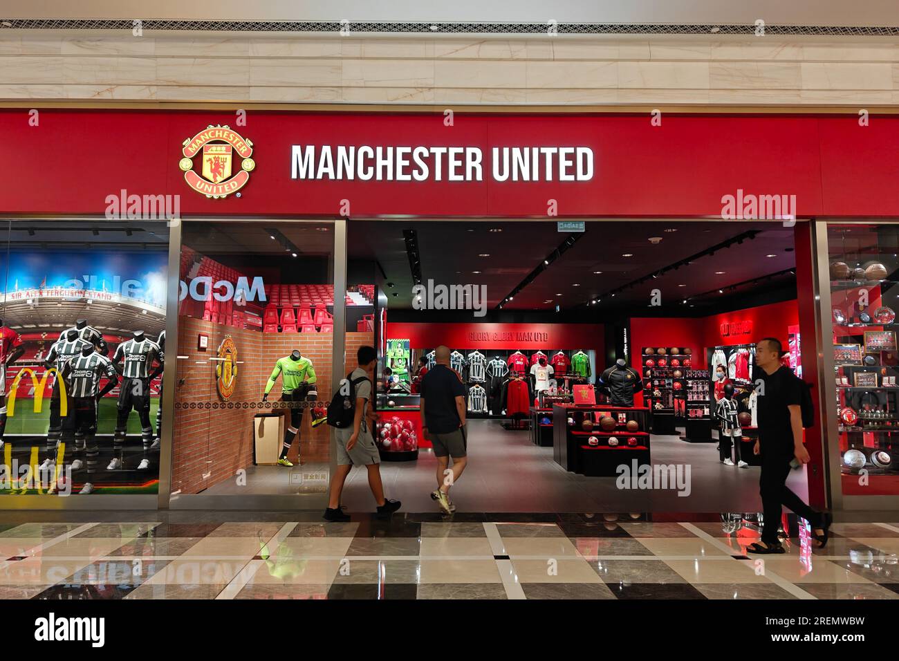 MACAU, CHINA - JULY 27, 2023 - Tourists shop at Manchester United's ...