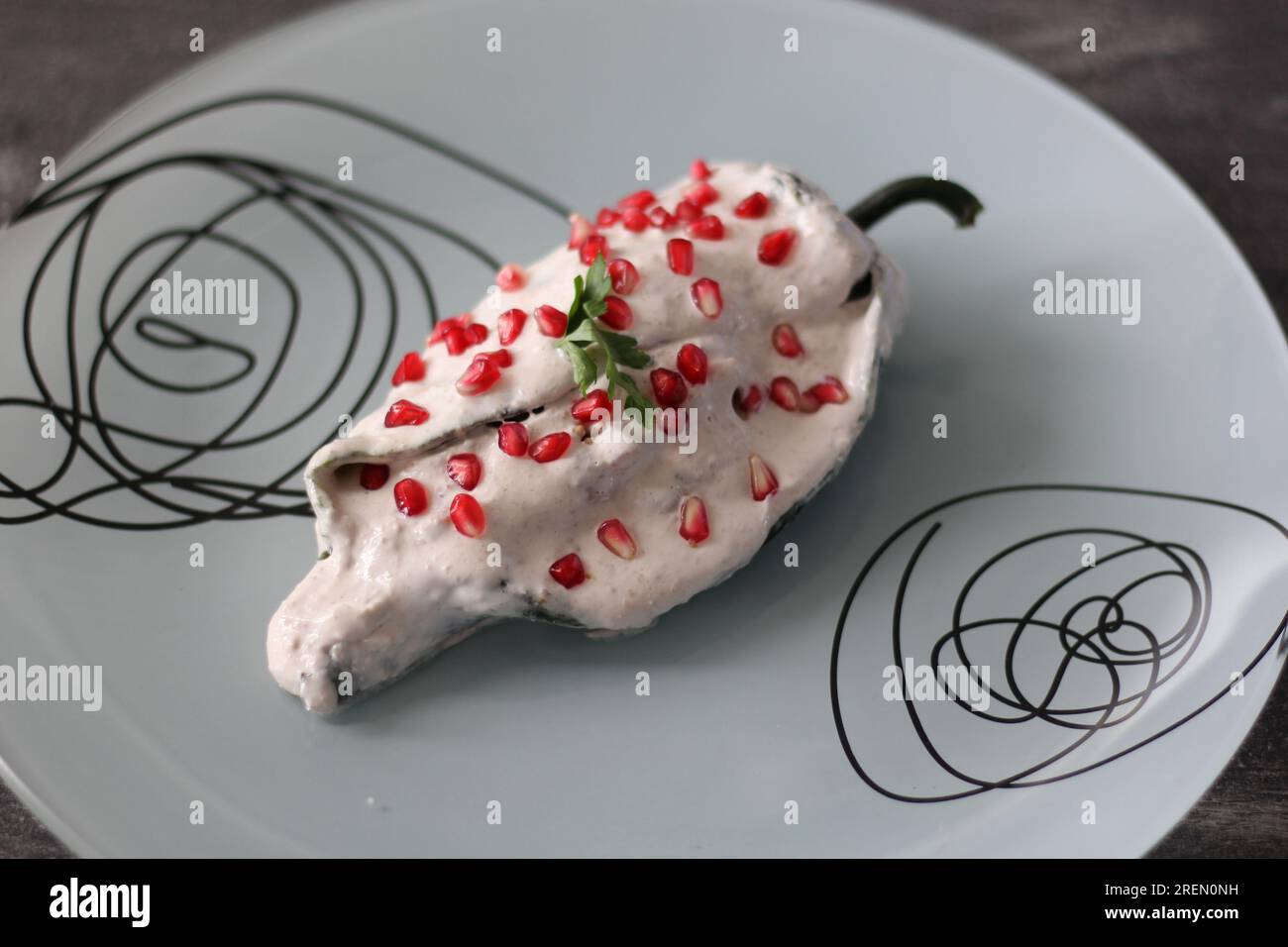 Close-up chiles rellenos en nogada, traditional Mexican gourmet food ...