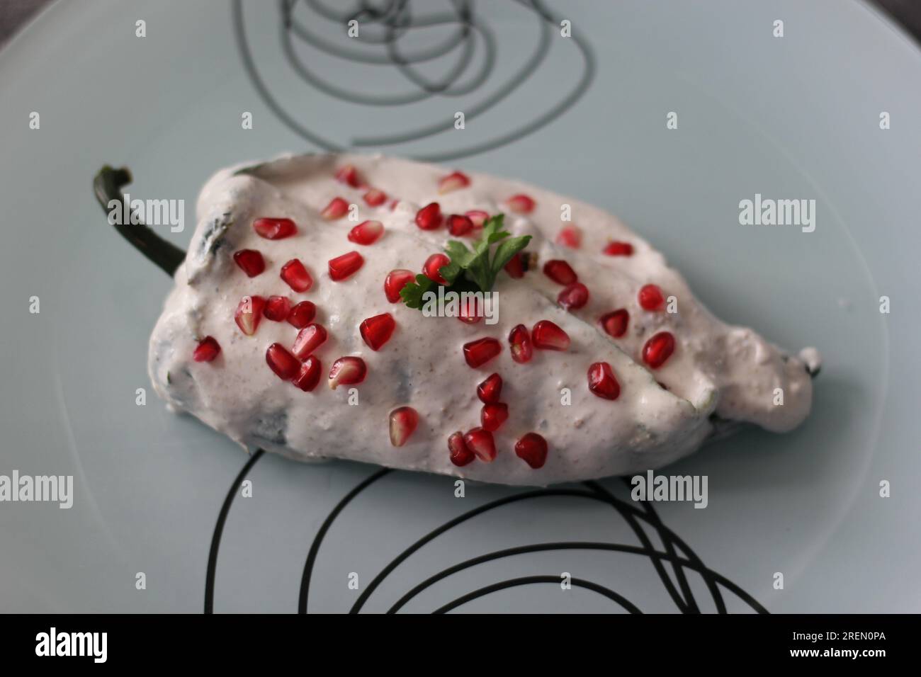 Close-up chiles rellenos en nogada, traditional Mexican gourmet food ...