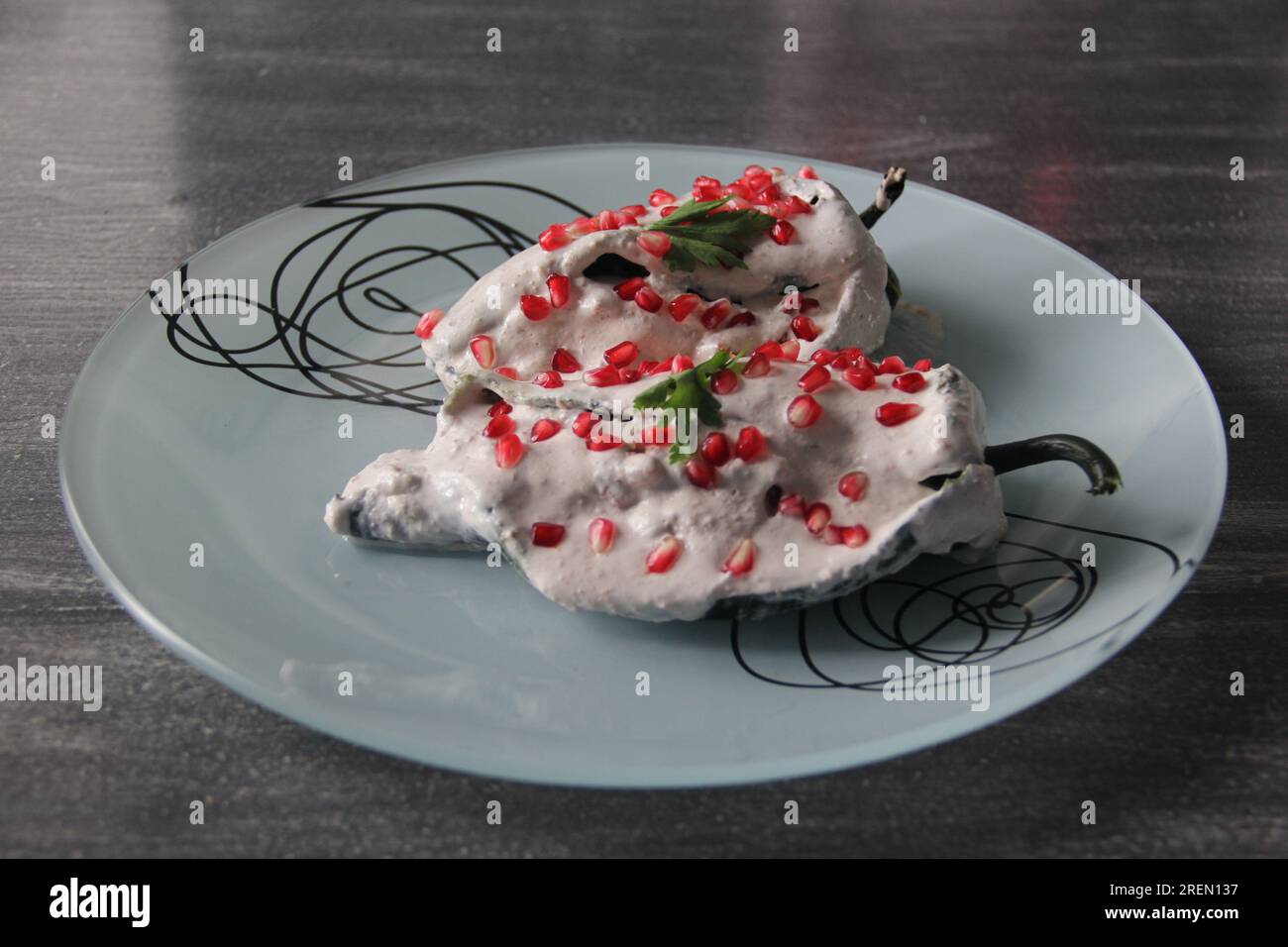 Close-up chiles rellenos en nogada, traditional Mexican gourmet food ...