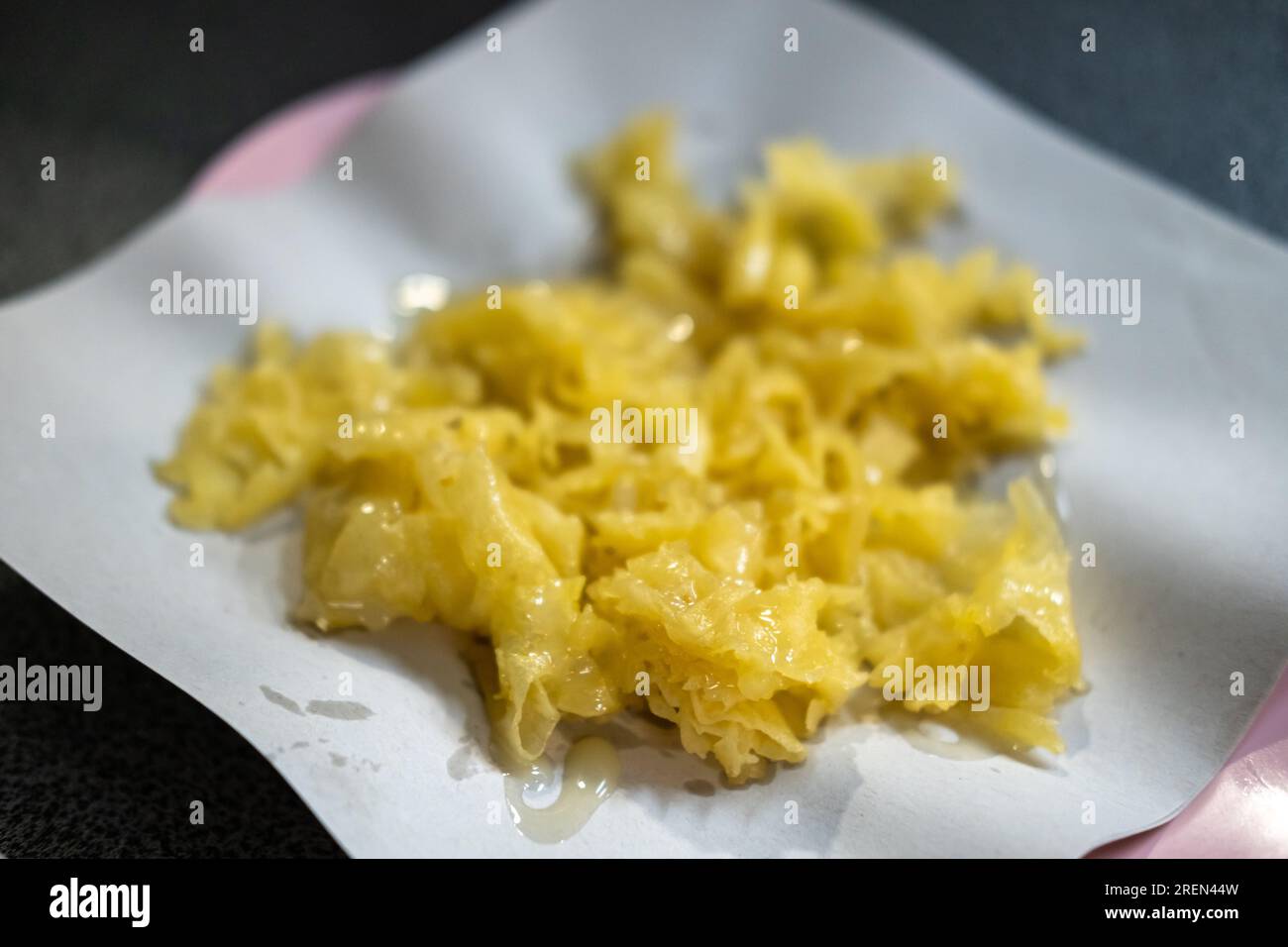 Crispy Roti with condensed milk, served on plate Stock Photo - Alamy