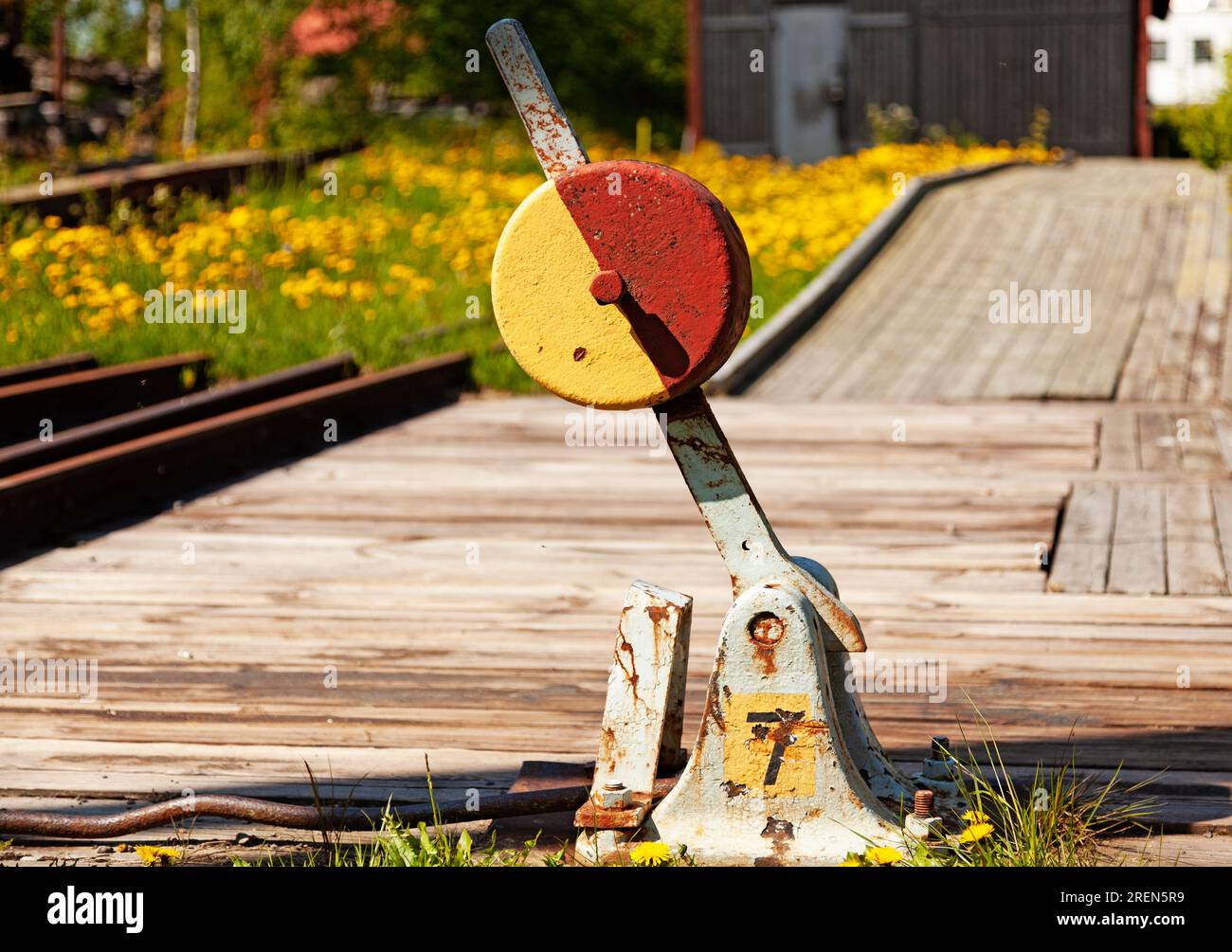 close-up switch part for train tracks in red and yellow Stock Photo - Alamy