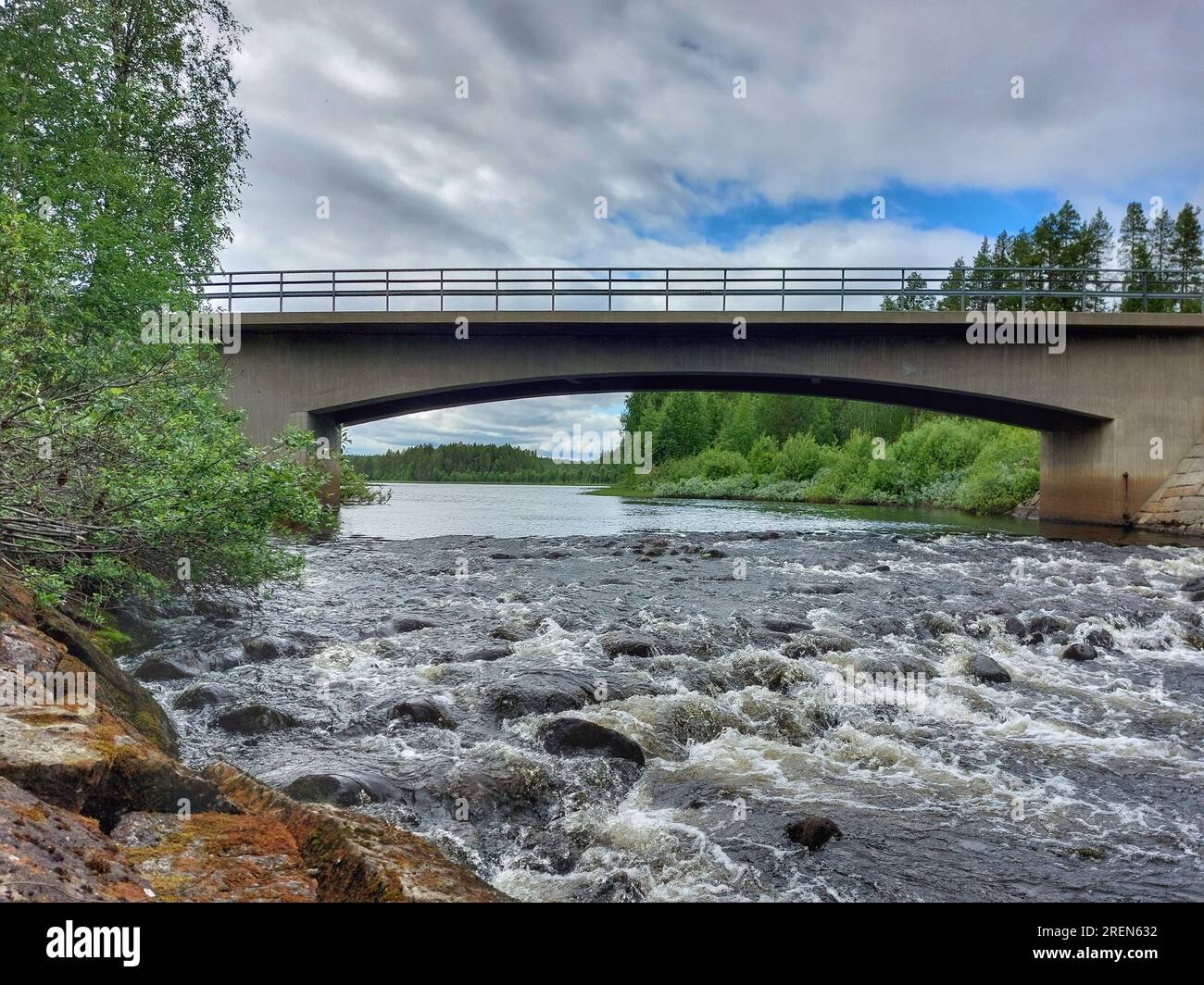 Bridge over rapids in a northern Swedish river Stock Photo - Alamy