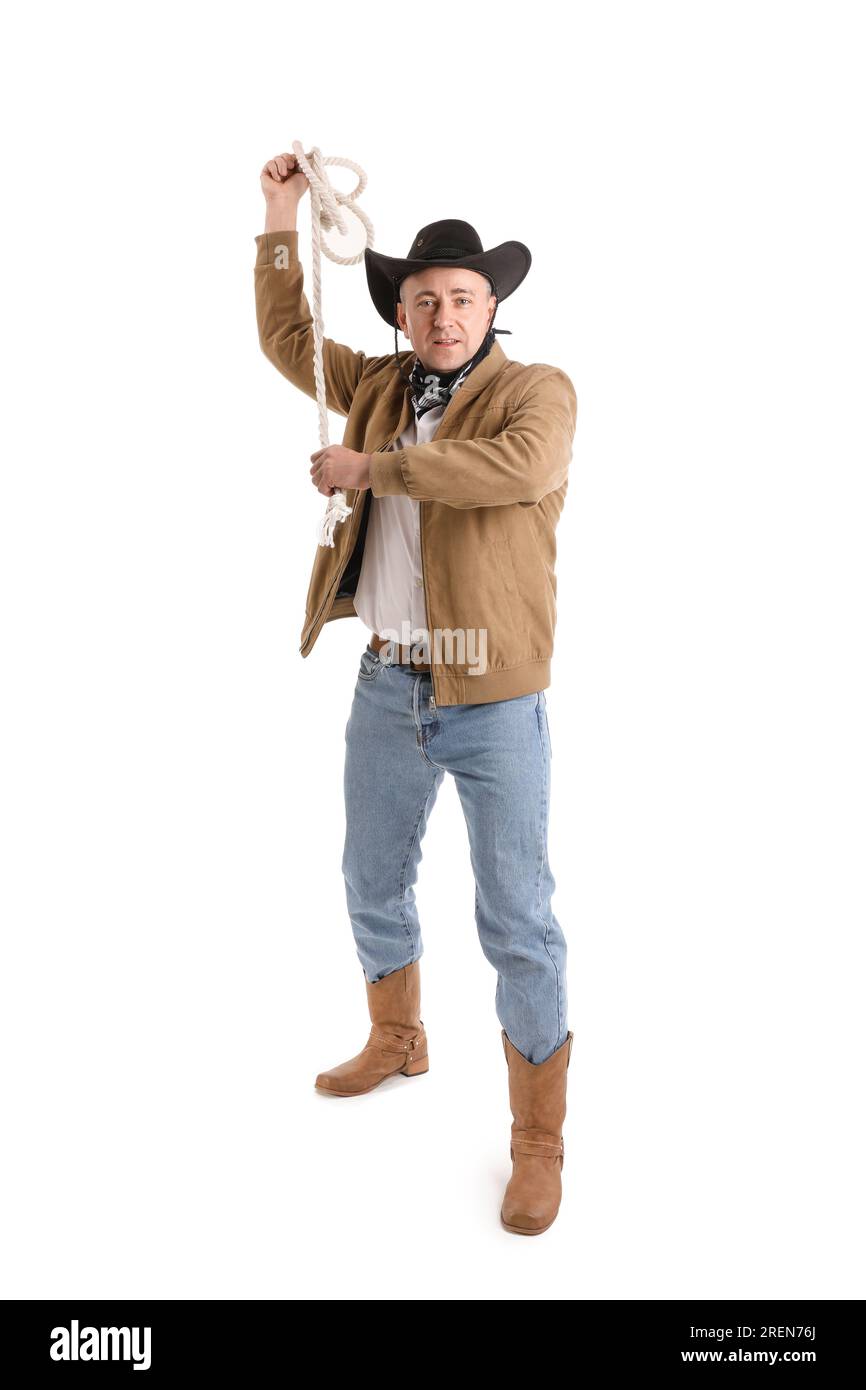 Mature cowboy with lasso on white background Stock Photo - Alamy