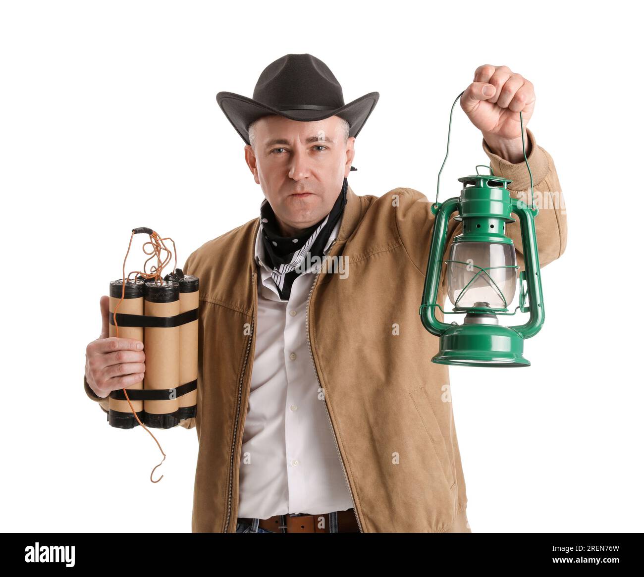 Mature cowboy with explosive and lantern on white background Stock ...