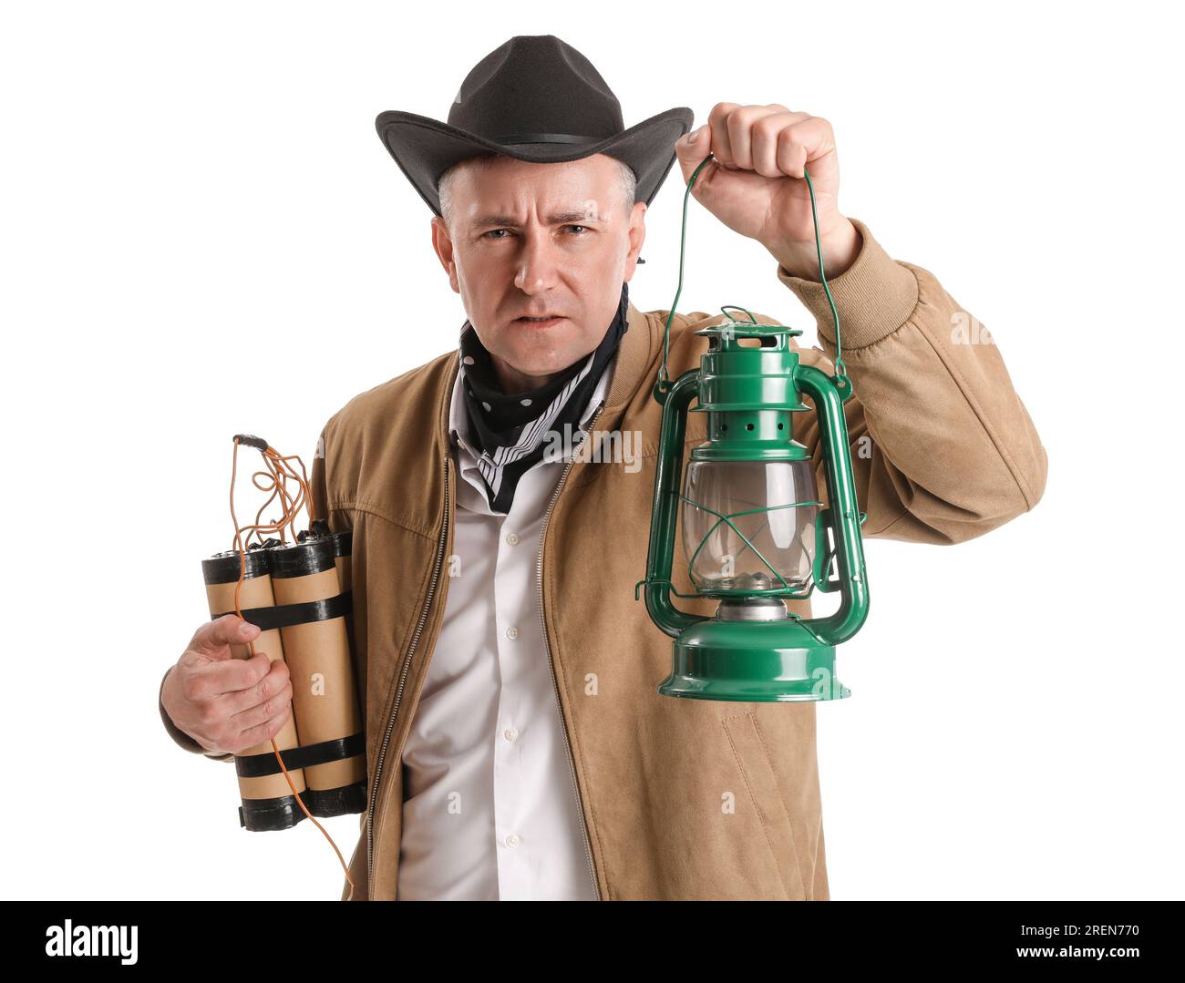 Mature cowboy with explosive and lantern on white background Stock ...