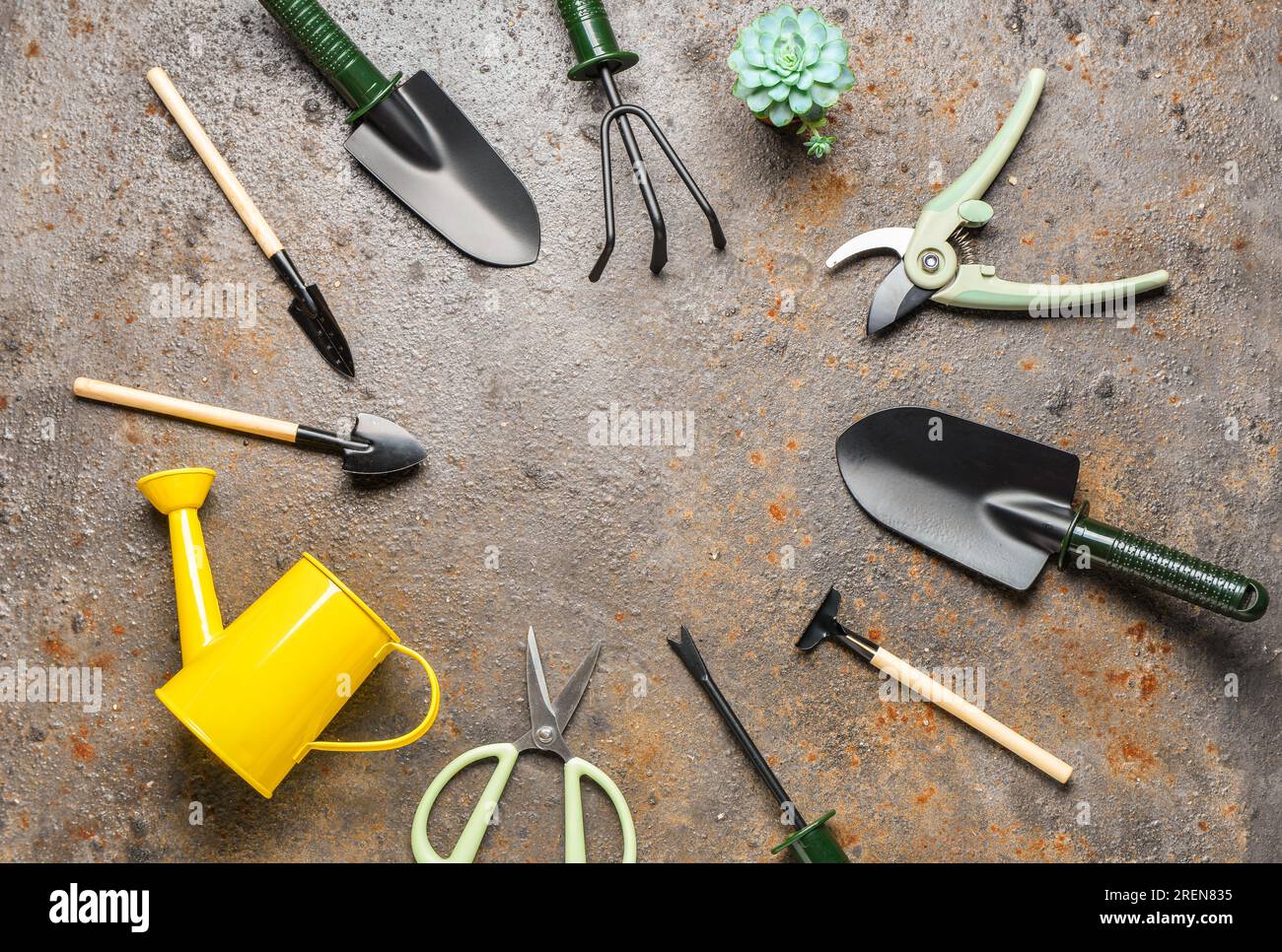 Frame made of different gardening tools on grey grunge background Stock ...